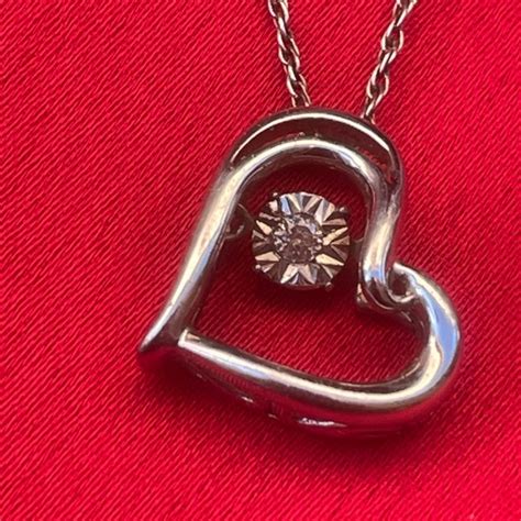 Zales Jewelry Zales Unstoppable Heart Tm 8 Heart With Spinning Tiny Diamond Necklace Poshmark