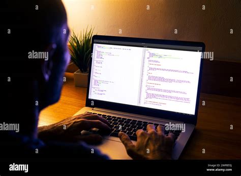 Developer Programmer Writing Html Javascript Code In A Laptop Stock