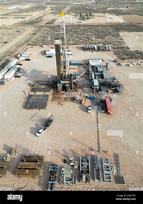 aerial view of an oil production rig drilling operation in the permian