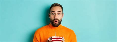 Free Photo Closeup Of Happy Adult Man Celebrating Birthday Holding