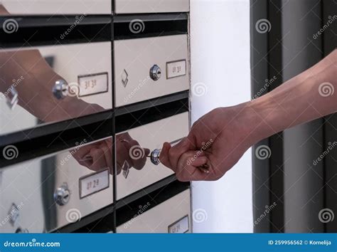Close Up Of A Male Hand Opening A Mailbox With A Small Key Stock Photo Image Of Post Concept