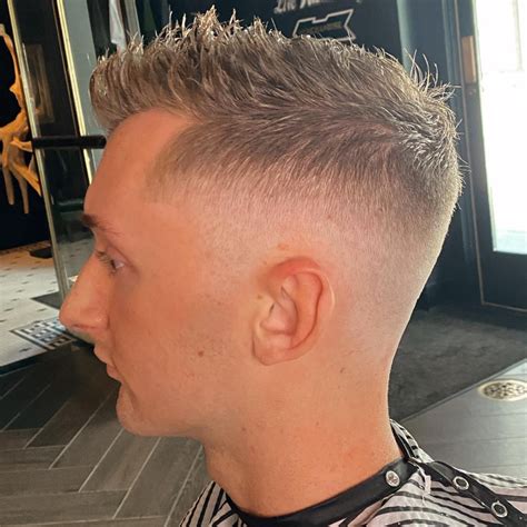 Low Taper Fade Haircut For Straight Hair Achieve A Sharp And Sleek Look
