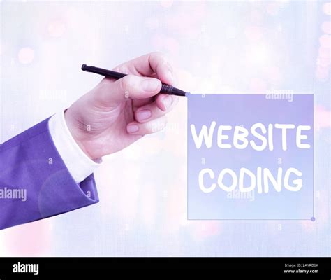 conceptual hand writing showing website coding concept meaning system of symbols and rules used