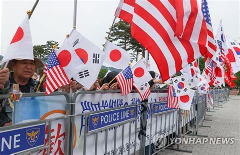欢迎日本首相访韩 韩联社