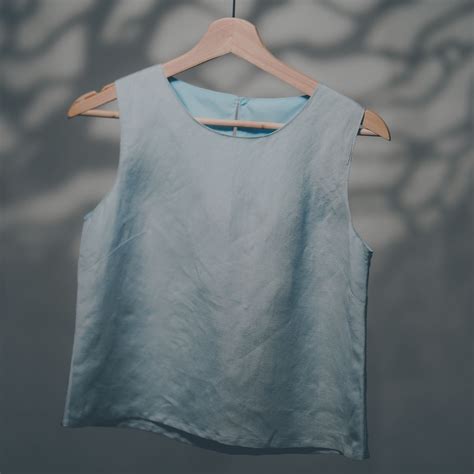 เสื้อแขนกุดสีฟ้า ผ้าลินิน100 ตัดเย็บเองไม่ใช่ผ้าโหล Shopee Thailand