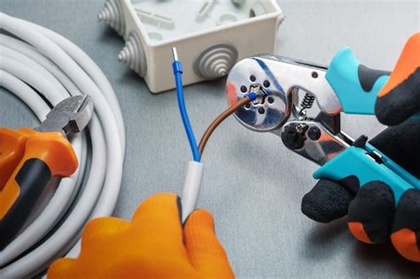 Premium Photo Electrician At Work Process Of Connecting Wires Closeup