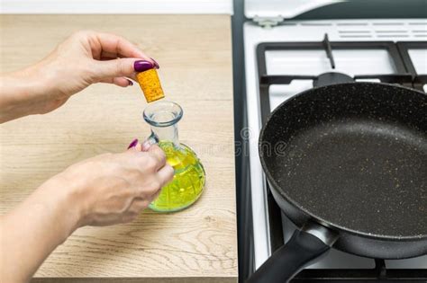 Housewife Opens A Bottle Of Cooking Oil Stock Image Image Of Frying