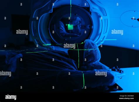 A Young Man Undergoing Radiation Therapy For Cancer In A State Of The