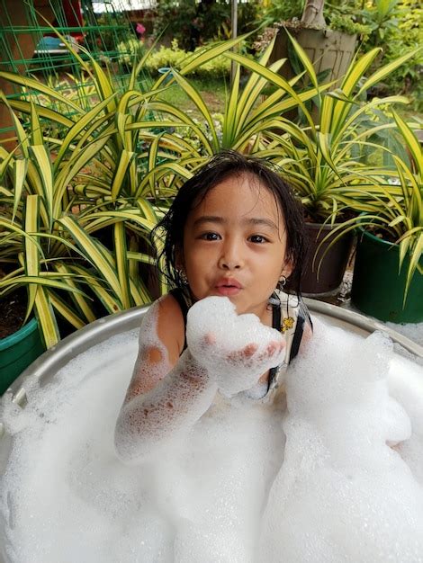 Premium Photo Portrait Of Cute Girl In Water