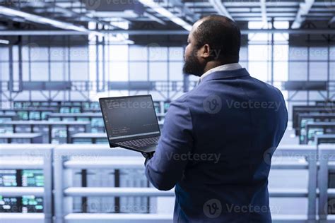 It Staff Member In Data Center Implementing Backup Solutions To Protect Against Infrastructure