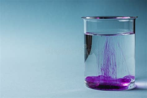 Potassium Permanganate Solution On A Blue Background Stock Image