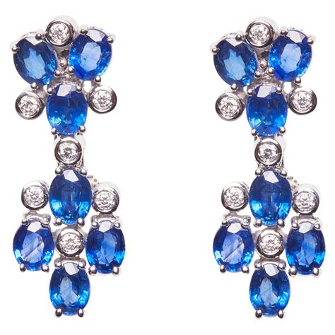 18 Karat White Gold Diamond And Sapphire Dangle Earrings For Sale At