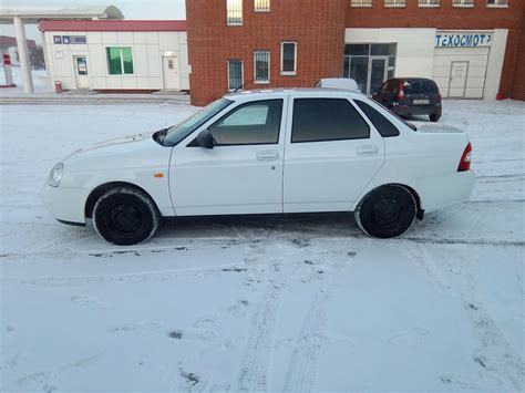 Колпаки колес и ручка закрытия багажника — Lada Приора седан, 1,6 л ...