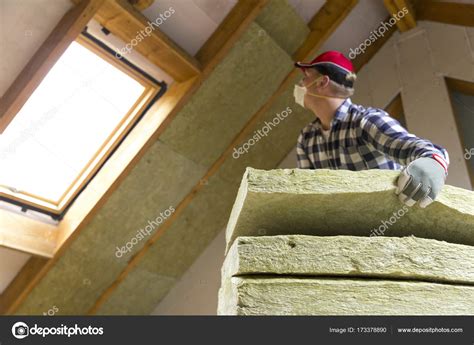 Man Installing Thermal Roof Insulation Layer Using Mineral Woo Stock Photo By Artursfoto1