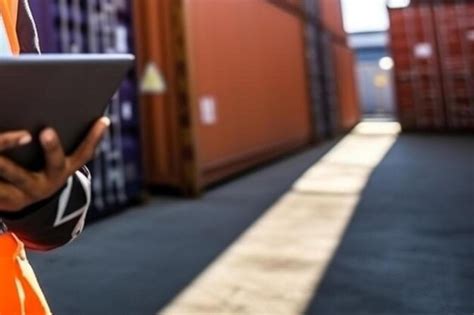 Premium Photo Forklift Driver Loading A Shipping Cargo Container With A Full Pallet With Boxes