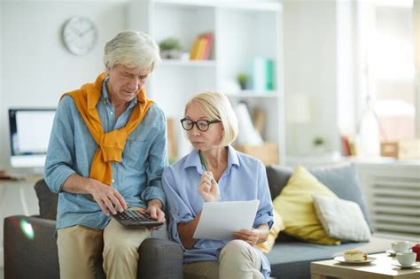 Premium Photo Adult Couple Calculating Budget