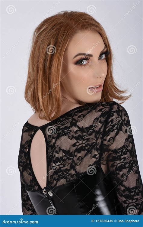 Sexy Busty Redhead In Short Tight Latex Dresses Stock Image Image Of Cheeky Background