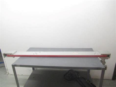 Overhead 67in Long Red Belt Conveyor For Labeler W 90 Degree Gearbox