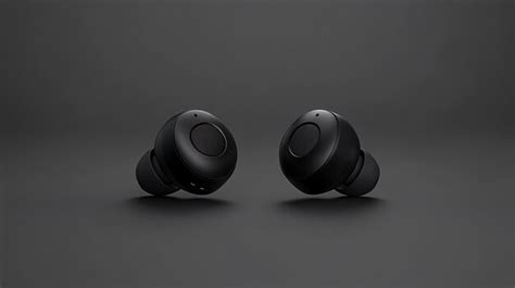 Black Wireless Earbuds Isolated On A Gray Background Premium Ai Generated Image