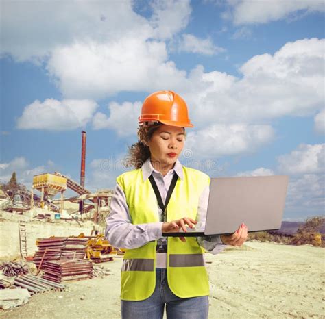 Female Asian Engineer Using A Laptop Computer Stock Image Image Of