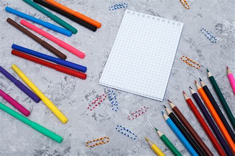 Premium Photo Colored Pencils Felt Tip Pens A White Sheet And Paper