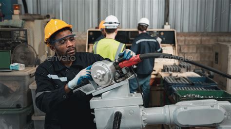 Industrial Engineers Are In Charge Of Controlling The Automated Robot