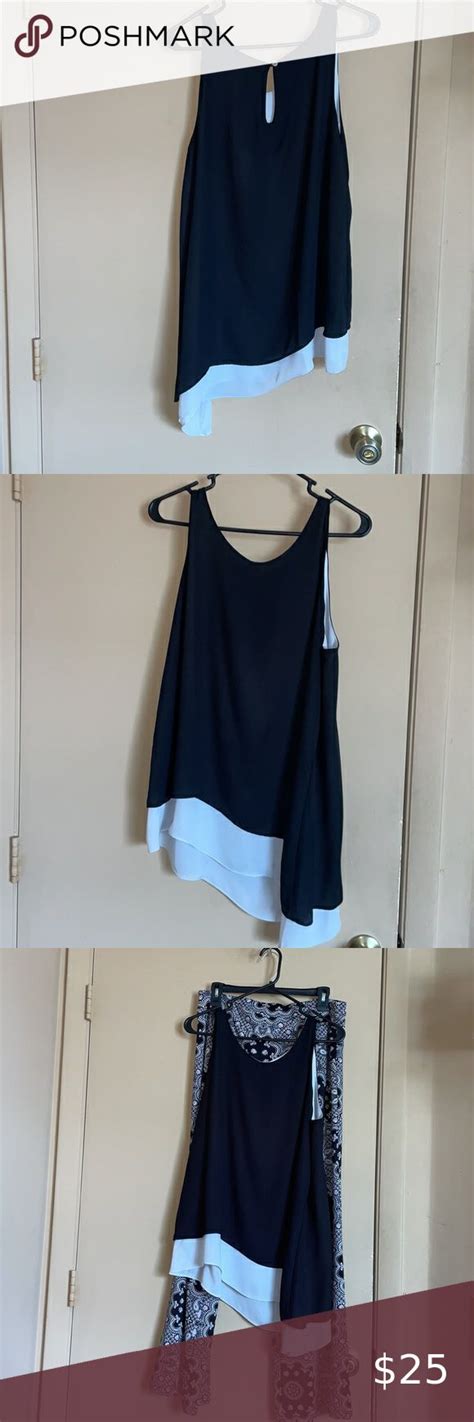 Sleeveless Blouse With Flowing Slanted Bottom Sleeveless Blouse