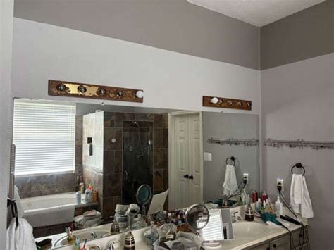 Replacing Light Fixtures And Adding Storage In Master Bathroom