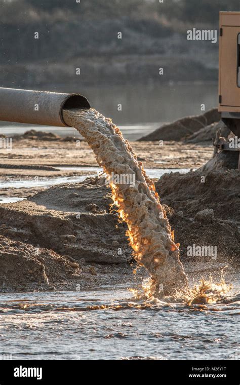 Industrial Effluent Pipeline Discharging Liquid Industrial Waste Into A River Stock Photo Alamy