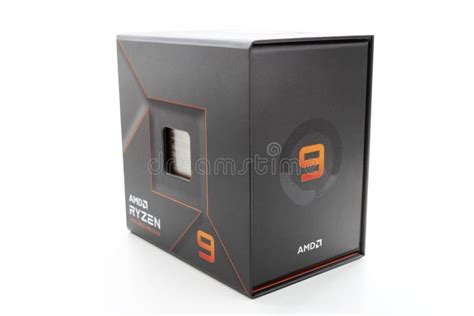A Close Up Of An Amd Ryzen 9 7900x Processor In A Packaging Box