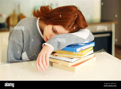 The Girl Studying Hard She So Tried And Sleeping With Books On Table Learning For Idea To
