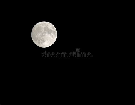 Bright Full Moon And Craters Are Seen In The Black Starless Sky Stock Image Image Of Craters