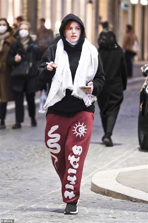 Bella Thorne Puffs On A Cigarette In Rome While Going Under The Radar In Baggy Sweats And A