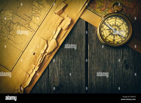 Antique Compass Over Old Map Stock Photo Alamy