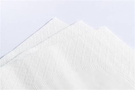 Premium Photo Close Up Of Tissue Paper On Table