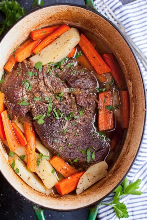 Dutch Oven Pot Roast With Carrots And Potatoes Feast And Farm