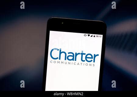In This Photo Illustration The Charter Communications Logo Is Seen