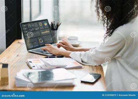 Female Analyst Analyzes Kpi Business Analytics Data Dashboard Management System On A Computer