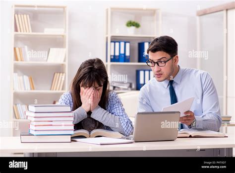 Male Lecturer Giving Lecture To Female Babe Stock Photo Alamy