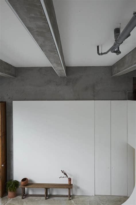 Rotunnojustman Combines Naked Concrete Details With Brick To Form Sleek Interiors For Photo Studio