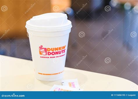 Dunkin Donuts Cup Of Hot Coffee And Sugar Sachet On Table Editorial