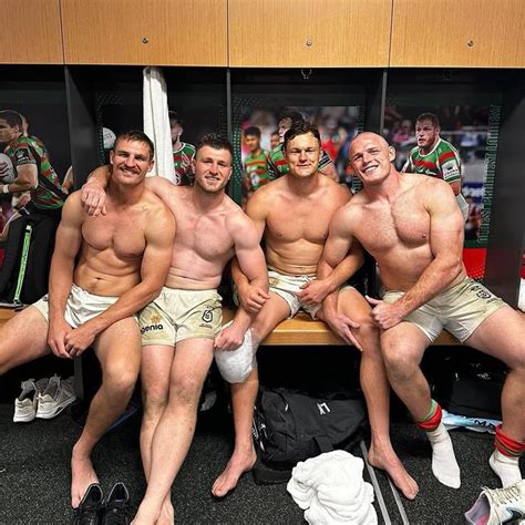 Muscular Shirtless Rugby Players Together In The Locker Room Shirtless