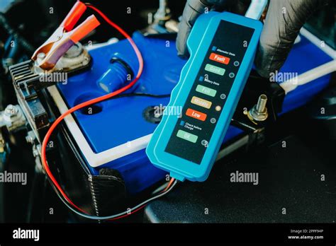 Checking A Car Battery Level With Car Battery Checker Car Repairing