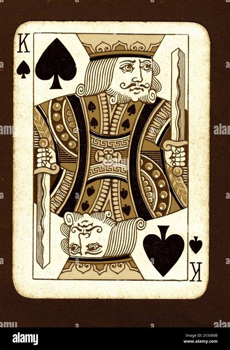 A Vintage King Of Spades Playing Card In Sepia On A Black Background