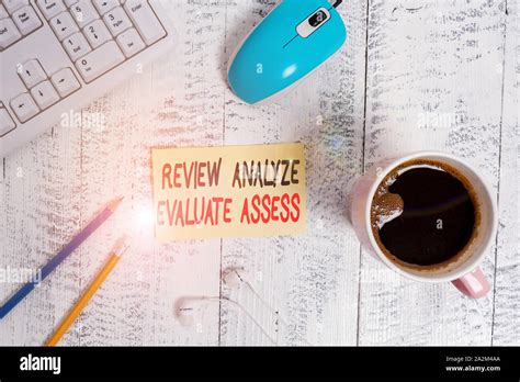 Conceptual Hand Writing Showing Review Analyze Evaluate Assess Concept