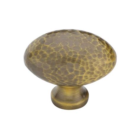 Heritage Oval Hammered Cupboard Knob 32mm Antique Brass Lacquered Broughtons Lighting