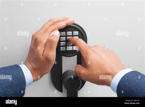 Interracial Businessman Hand Entering Security System Code Stock Photo Alamy