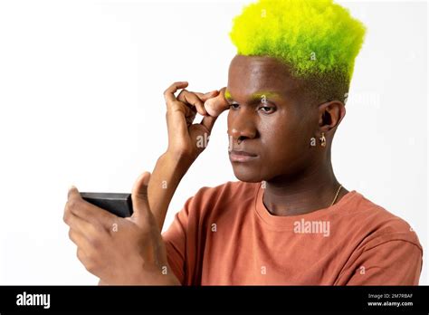 An Androgynous Black Man Posing Putting On Makeup Lgtbi Concept