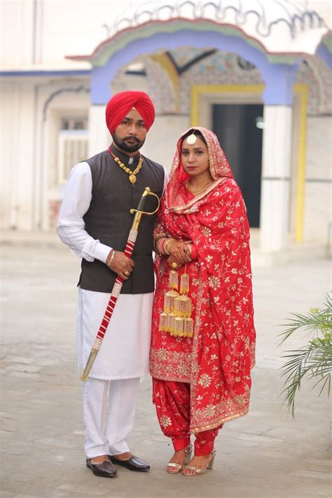 Punjabi Couple In Traditional Wedding Dress Traditional Dresses Images Traditional Dresses