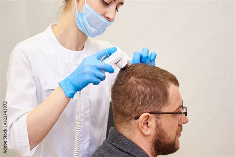 Microscopic Examination Of The Hair And Skin Of The Scalp Stock Photo Adobe Stock